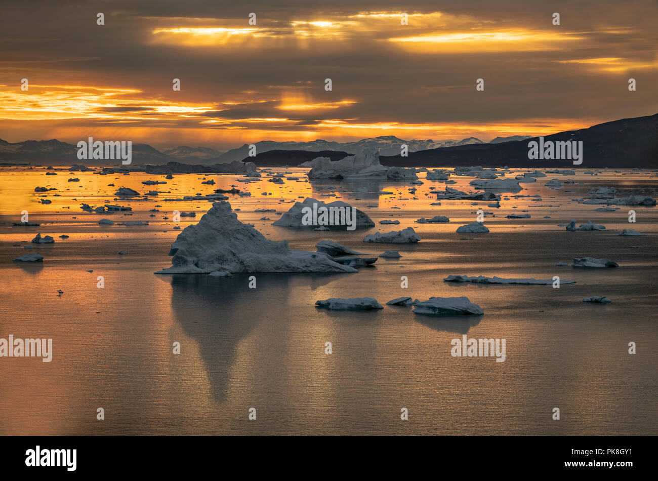 Iceberg at sunset. Nature and landscapes of Greenland. Disko bay. West ...
