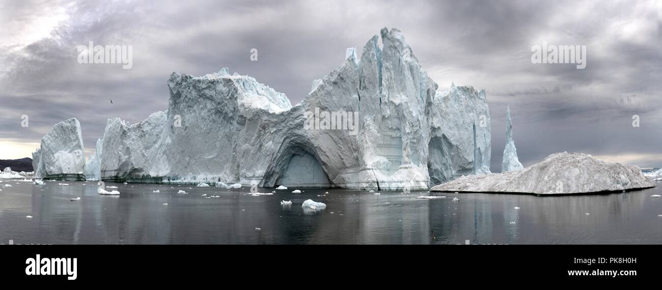 Iceberg floating in the water off the coast of Greenland. Nature and ...