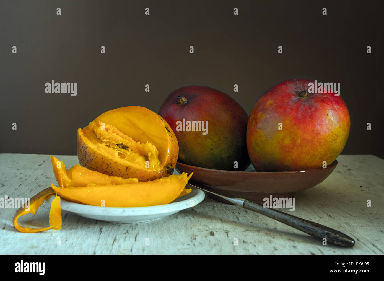 still life with mango. vintage. retro Stock Photo - Alamy