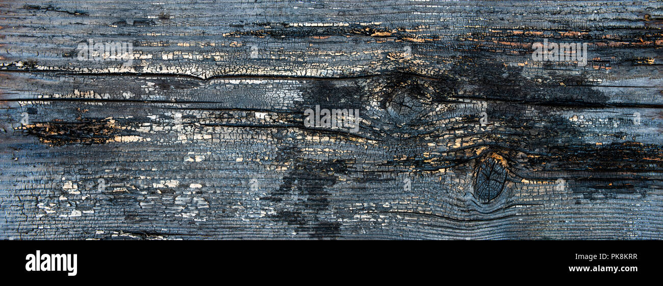 Burnt plank of wood Stock Photo - Alamy