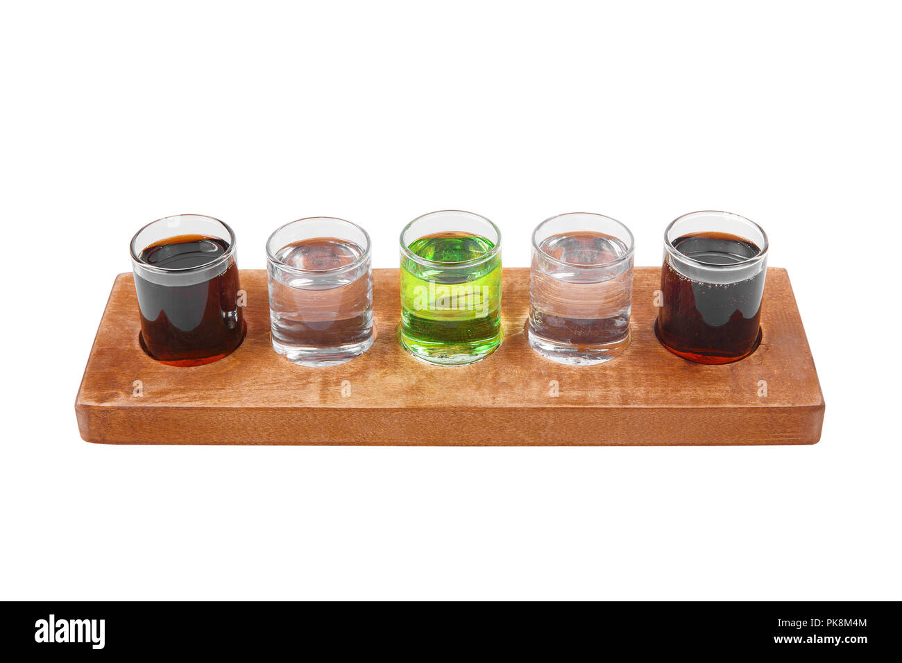 Multicolored transparent cocktails, a set of shots in one row, five ...