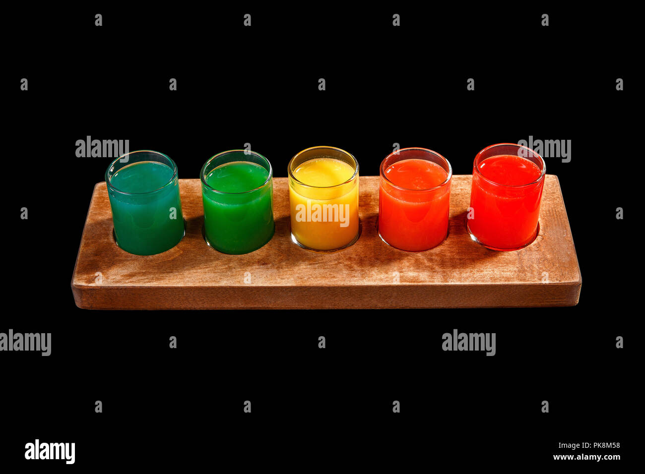 Multicolored opaque cocktails, a set of shots in one row, five servings ...