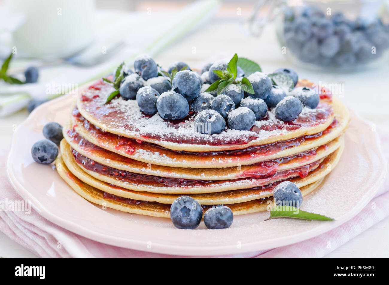 delish breakfast with fresh fruit on garden party, outside with flowers ...