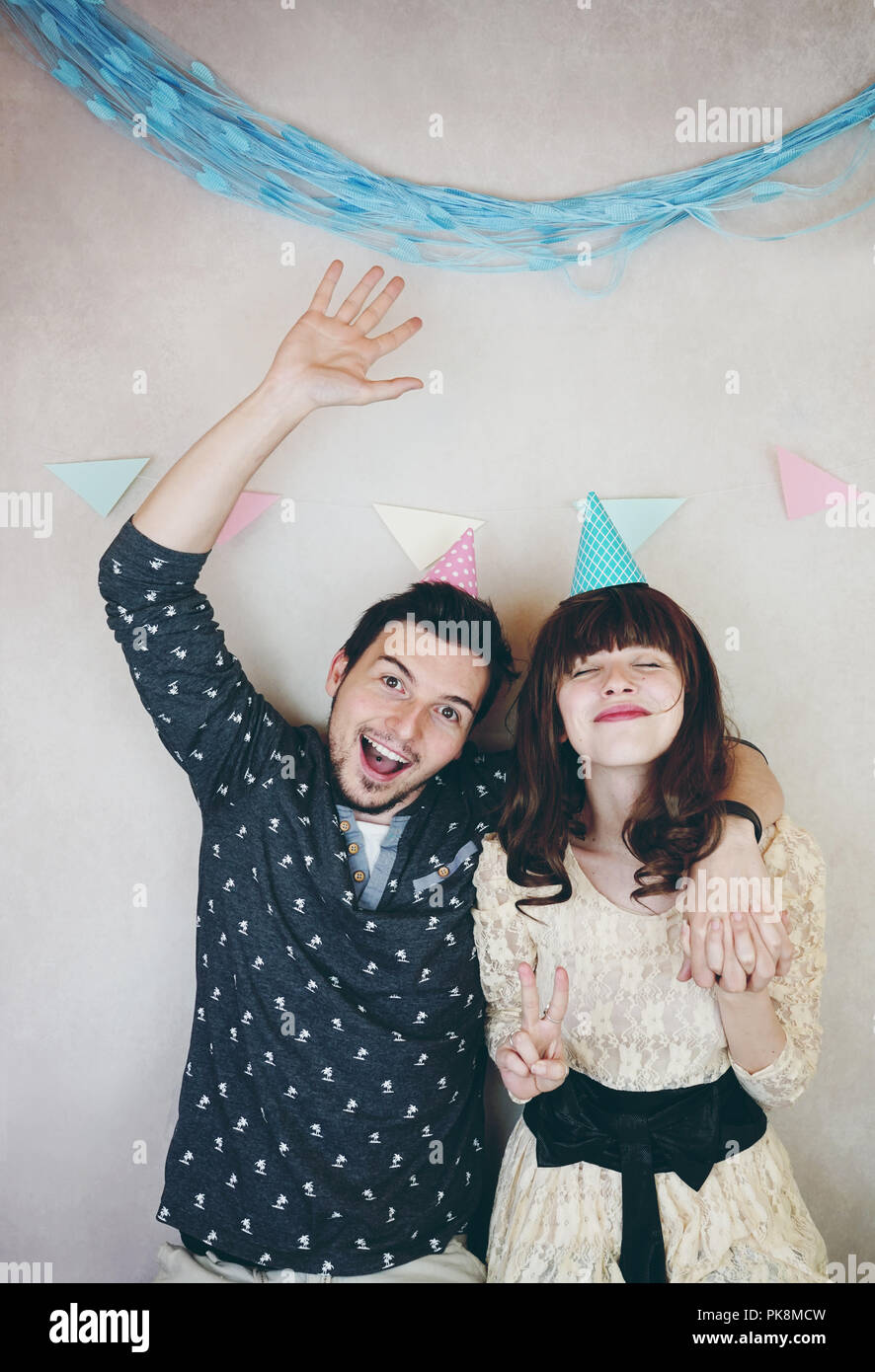 Young couple celebrating a birthday Stock Photo - Alamy