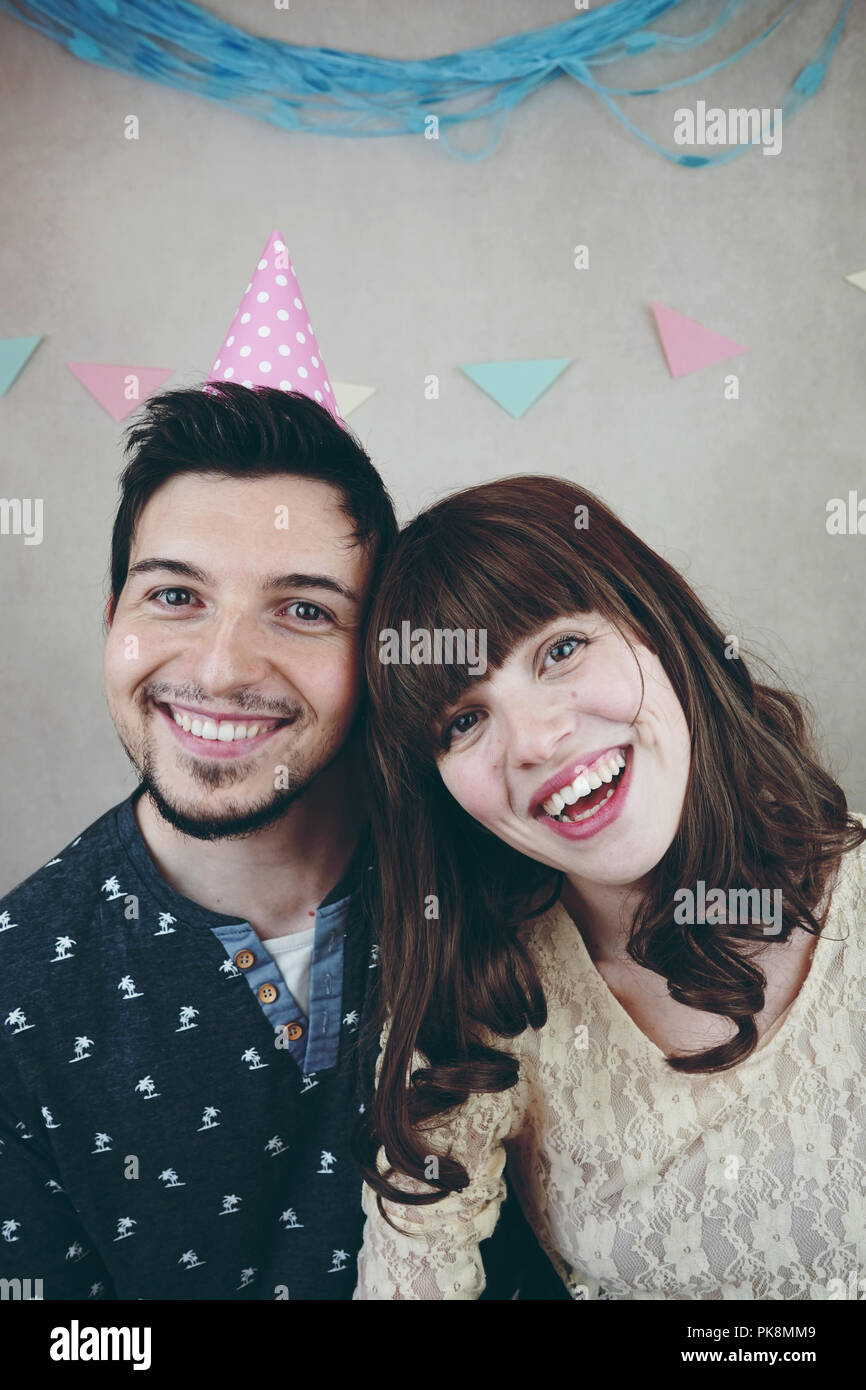 Young couple celebrating a birthday Stock Photo - Alamy