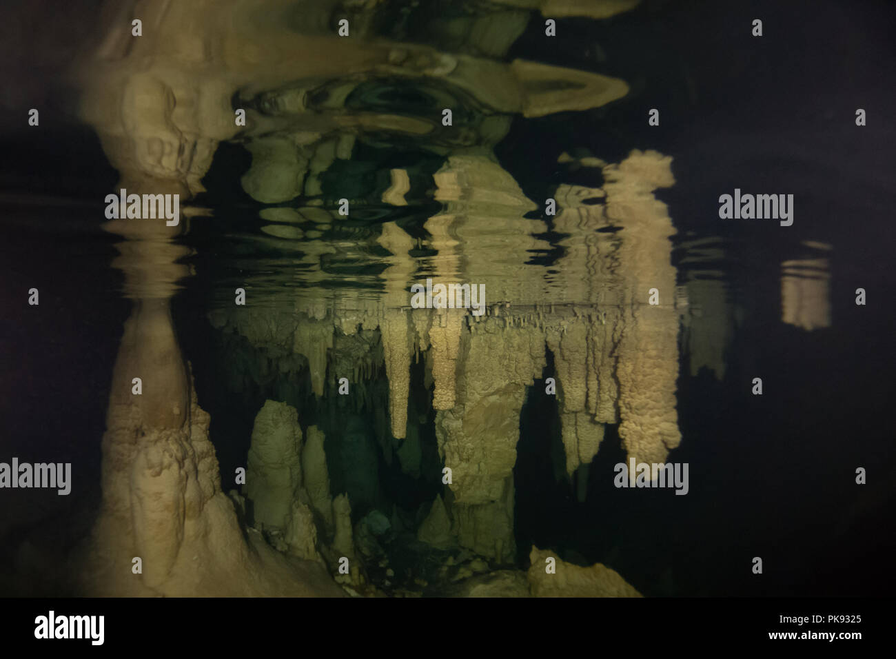 Exploring the incredible underwater grotto cave system with stalagtites ...