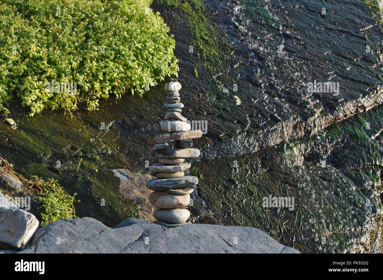Pile of pebble stones and waterfall. Zen and Harmony themes Stock Photo ...