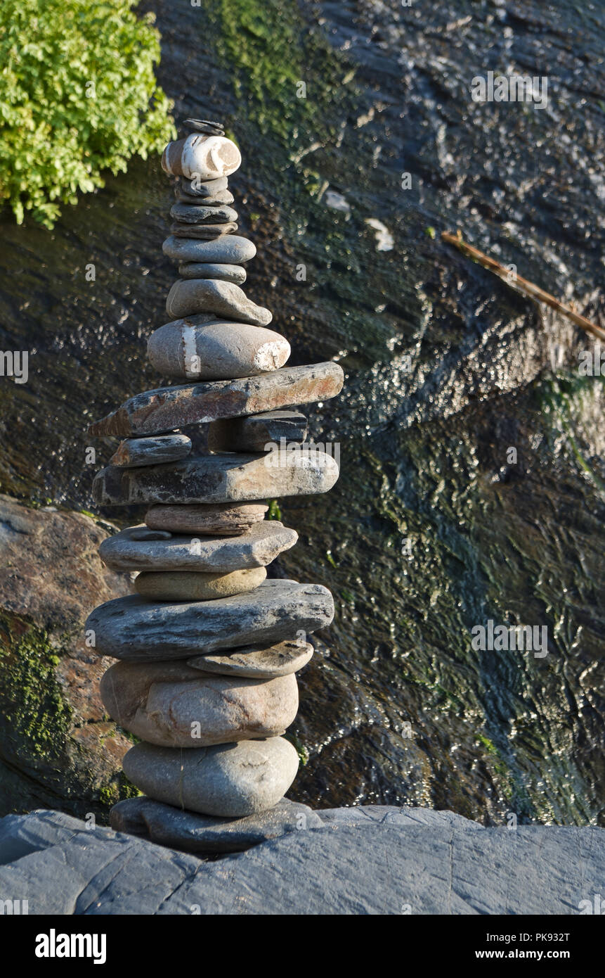 Pile of pebble stones and waterfall. Zen and Harmony themes Stock Photo ...