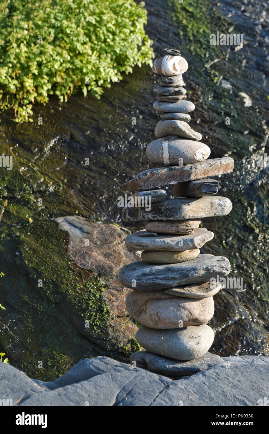Pile of pebble stones and waterfall. Zen and Harmony themes Stock Photo ...