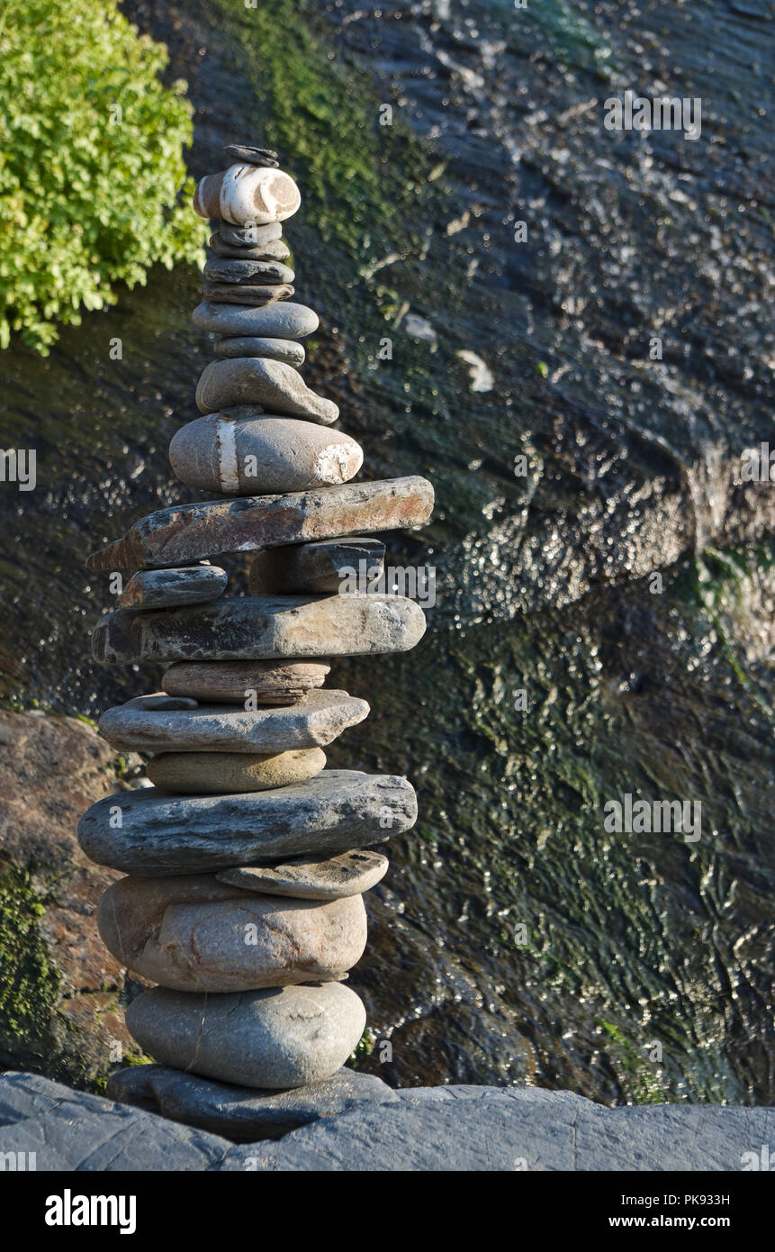 Pile of pebble stones and waterfall. Zen and Harmony themes Stock Photo ...