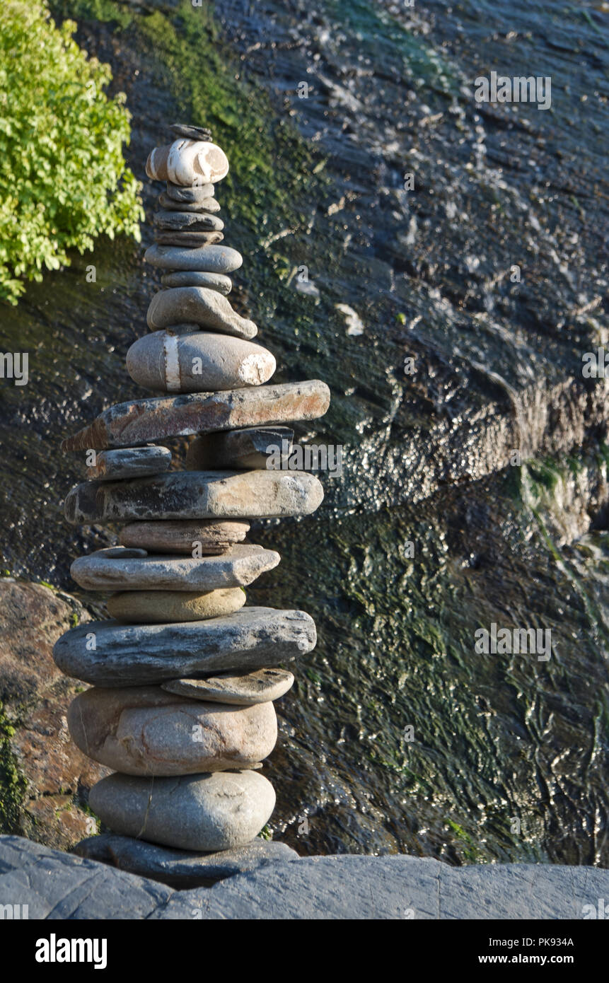 Pile of pebble stones and waterfall. Zen and Harmony themes Stock Photo ...