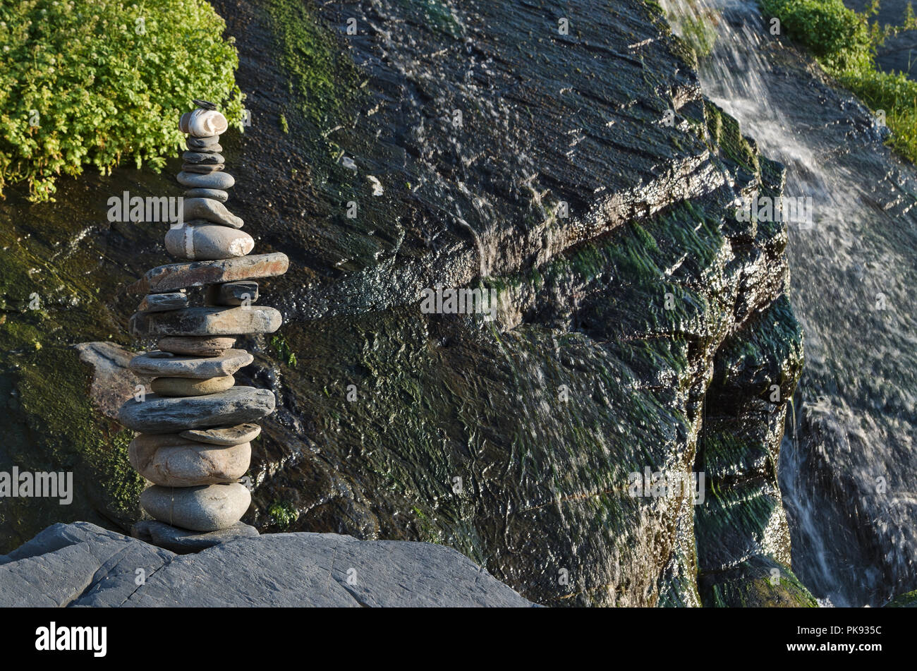 Pile of pebble stones and waterfall. Zen and Harmony themes Stock Photo ...