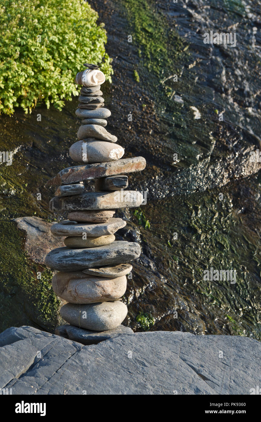Pile of pebble stones and waterfall. Zen and Harmony themes Stock Photo ...