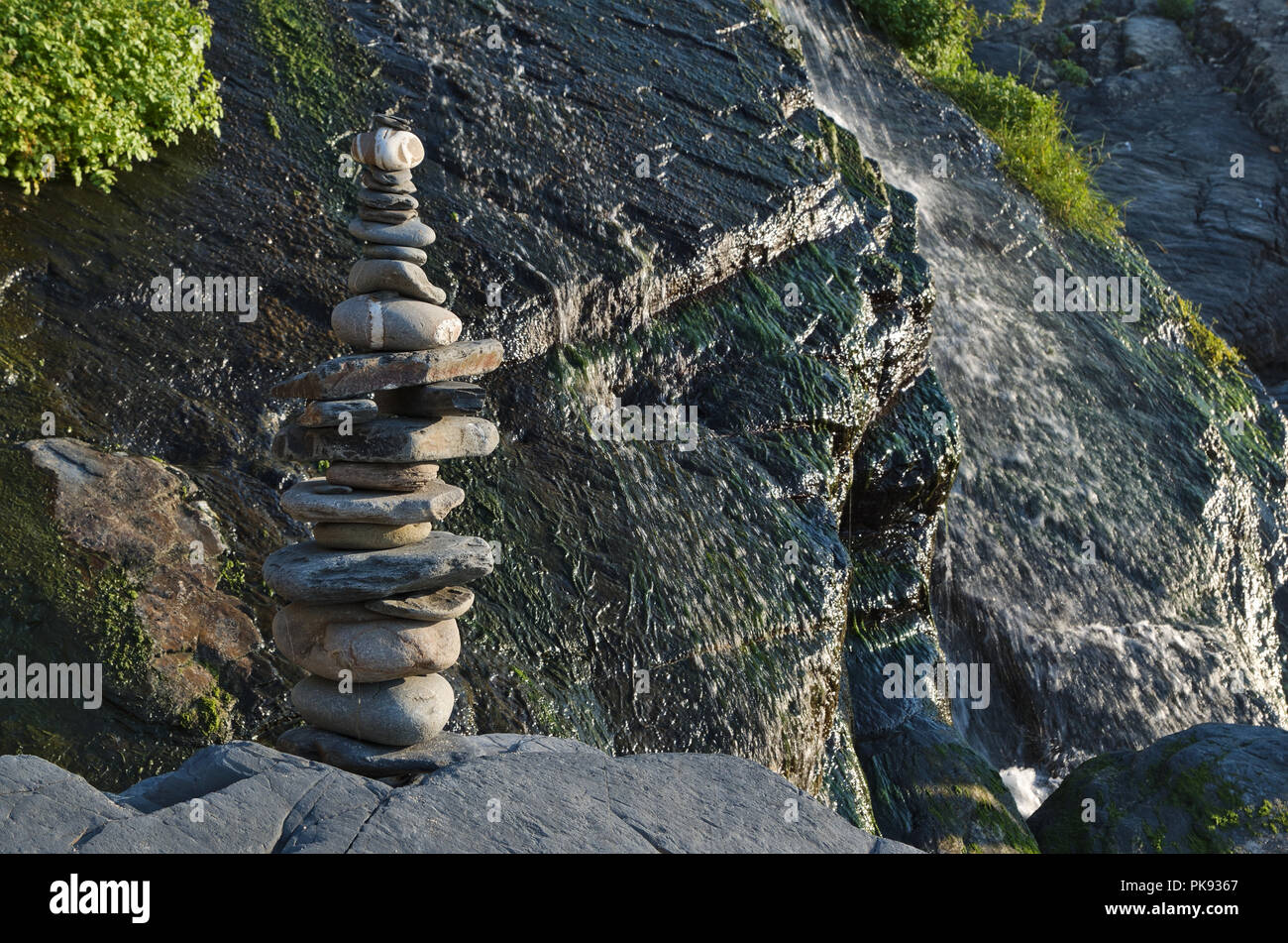 Pile of pebble stones and waterfall. Zen and Harmony themes Stock Photo ...