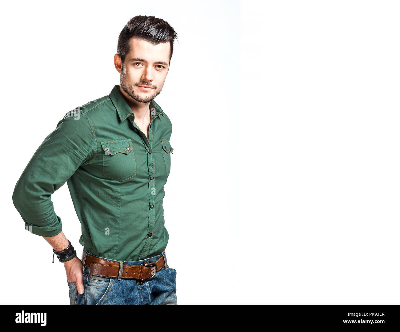 young man in the studio on a white background Stock Photo - Alamy