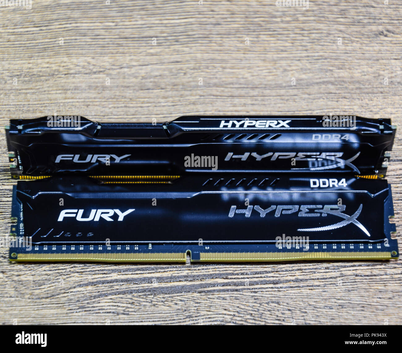 RAM Kingston Fury on a wooden table. RAM with a radiator. Overclocker ...