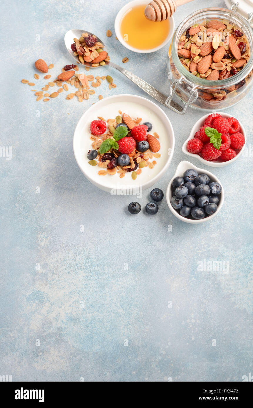 Homemade granola with yogurt and fresh berries, healthy breakfast ...