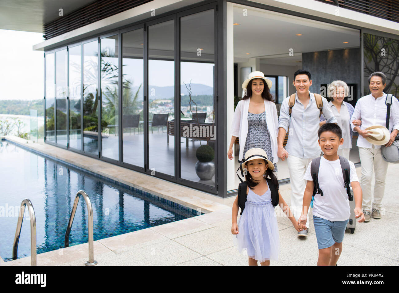 Happy family on vacation Stock Photo - Alamy