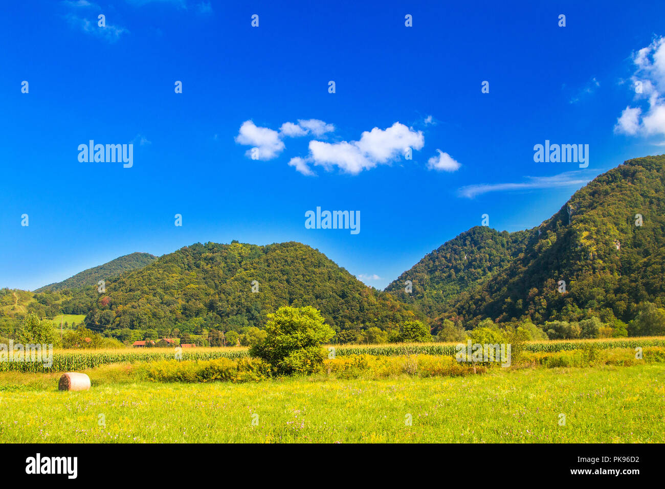 Green landscape, mountains and blue sky in Zagorje, Croatia Stock Photo ...