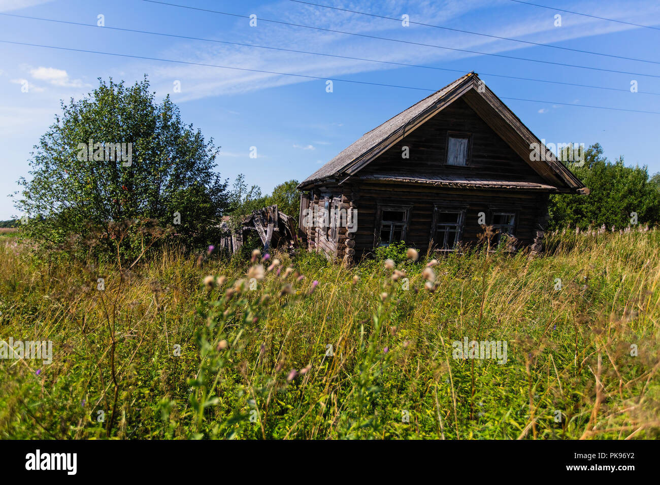Abandoned wooden house in a Russian nord village Stock Photo - Alamy