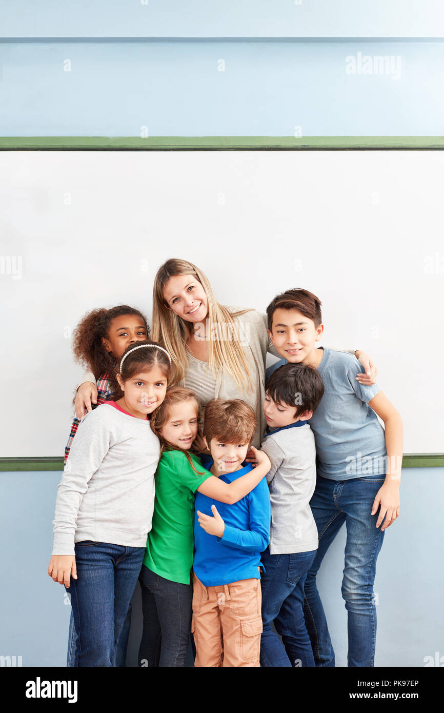 Multicultural school children in classroom hi-res stock photography and ...