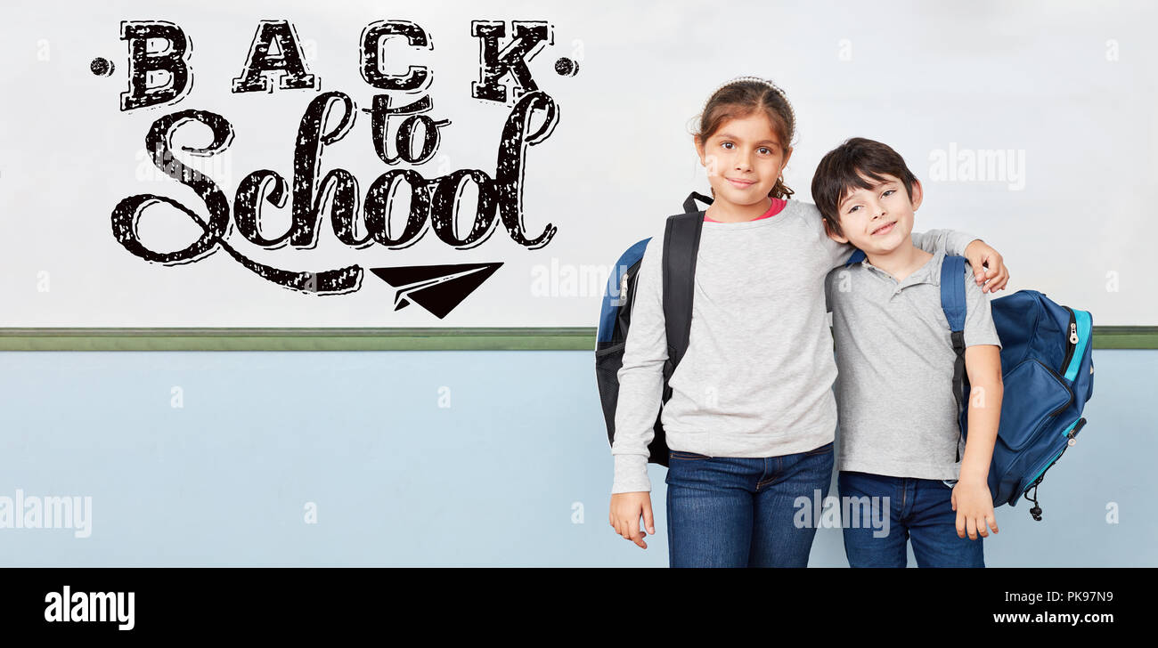 Two students back to back hi-res stock photography and images - Alamy