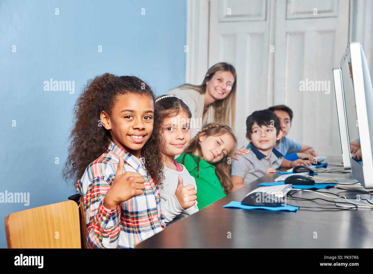 Children are happy in the computer science lessons of elementary school ...
