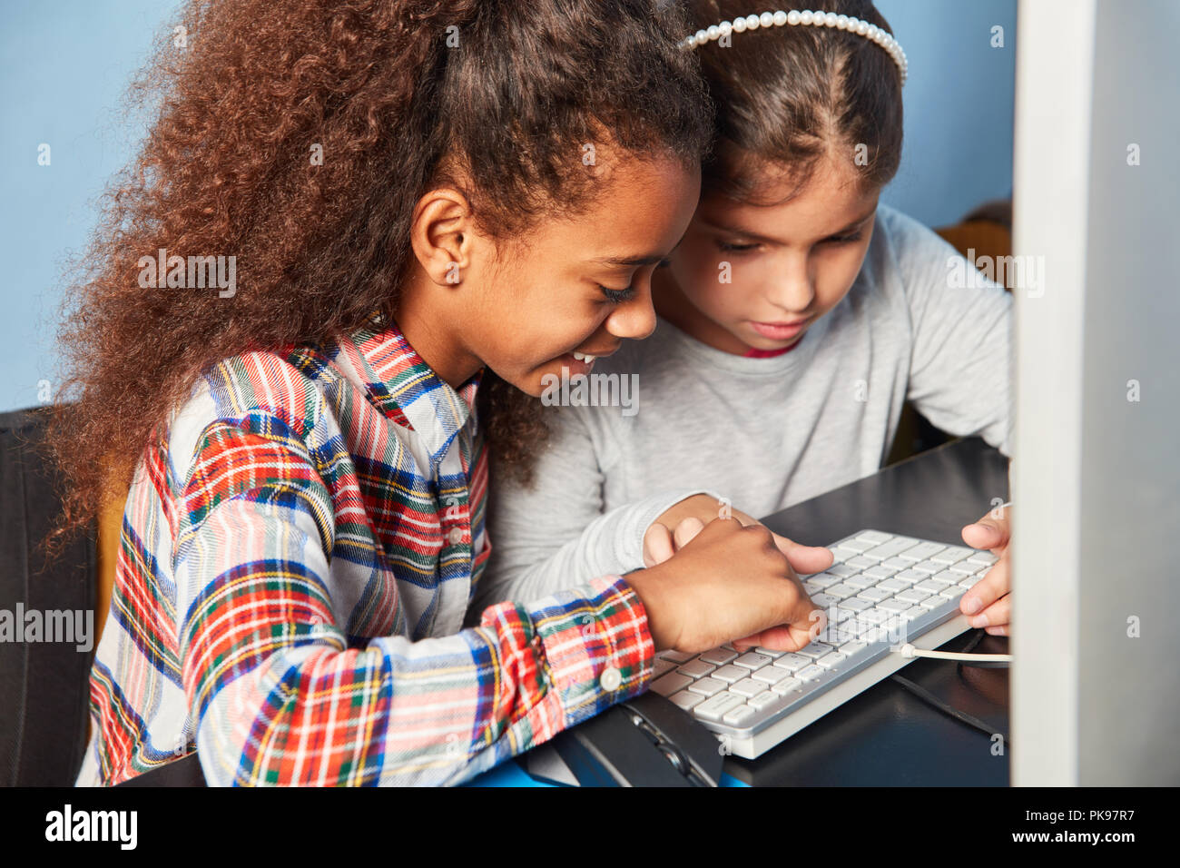 Students learn together on the PC in the computer science class of ...