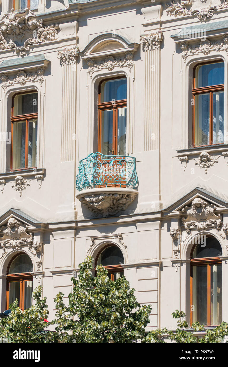 Beautiful decorative balcony of a house in Europe Stock Photo - Alamy