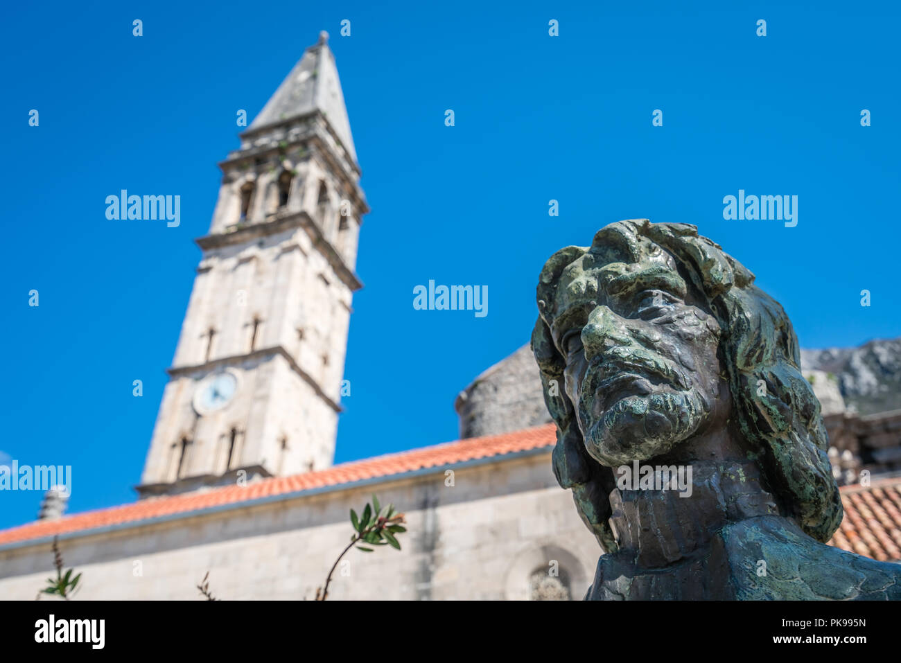 Tripo Rorolja statue in front of the Saint Nikola Church tower in ...