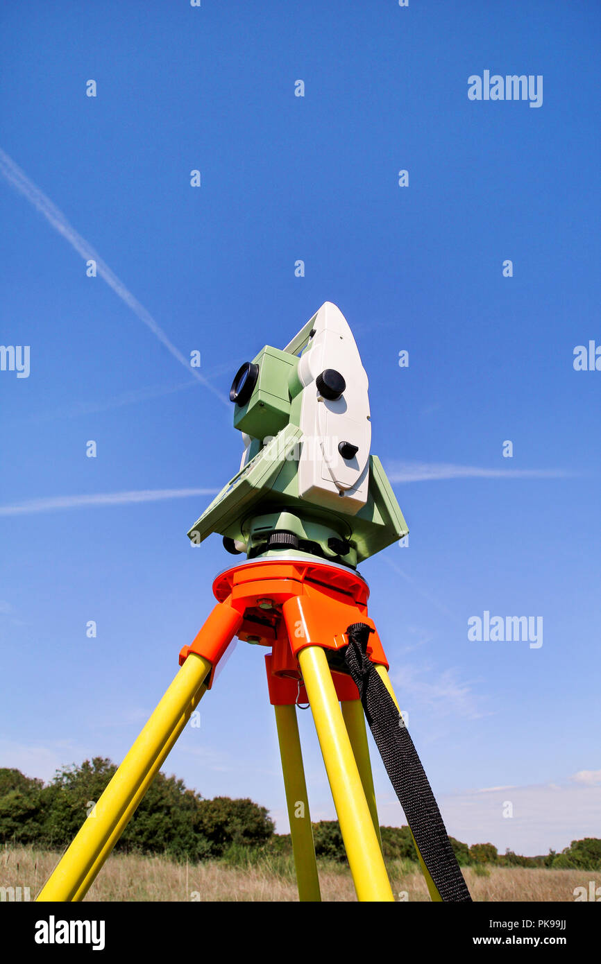 Total station with blue sky in the background. Survey Instrument ...