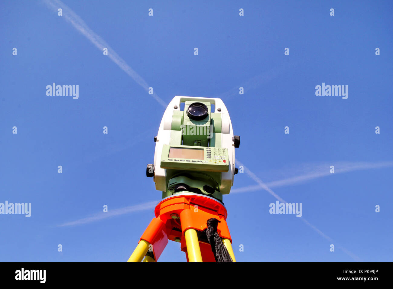 Total station with blue sky in the background. Survey Instrument ...