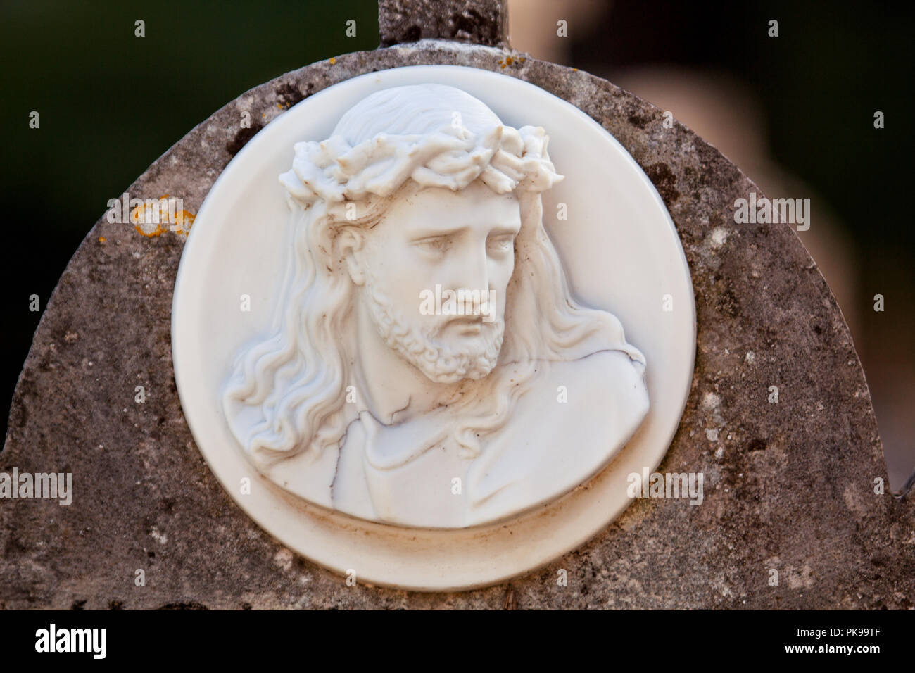 Vintage tombstones marble monument in old city cemetery, close up ...