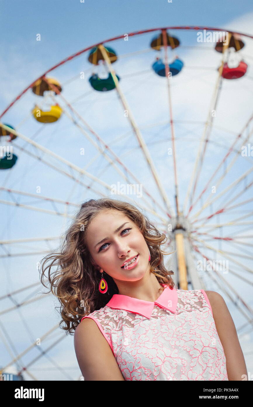 beautiful young blonde girl enjoying the summer in the Park of old ...