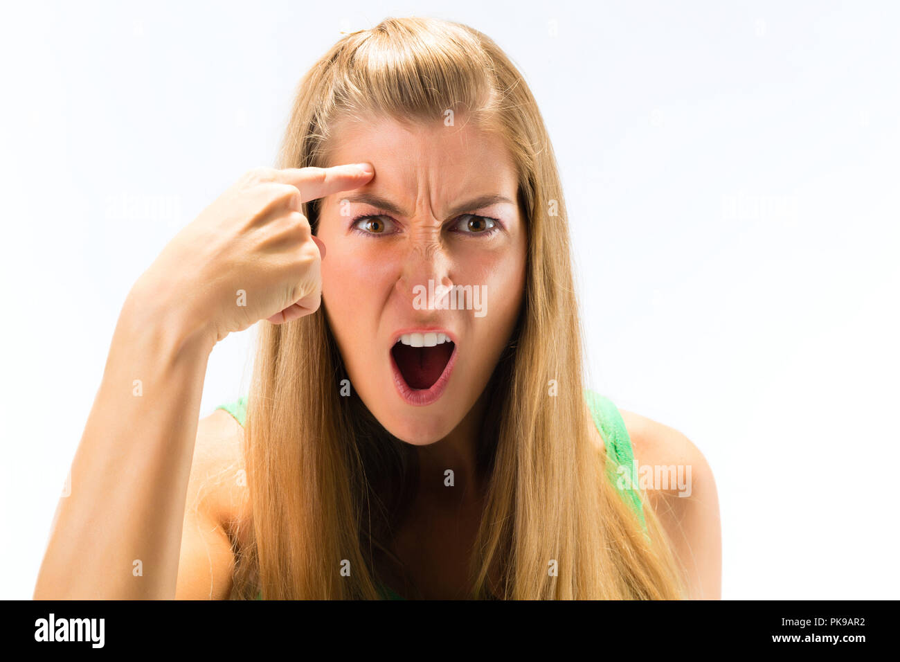 An angry young woman shouting Stock Photo - Alamy