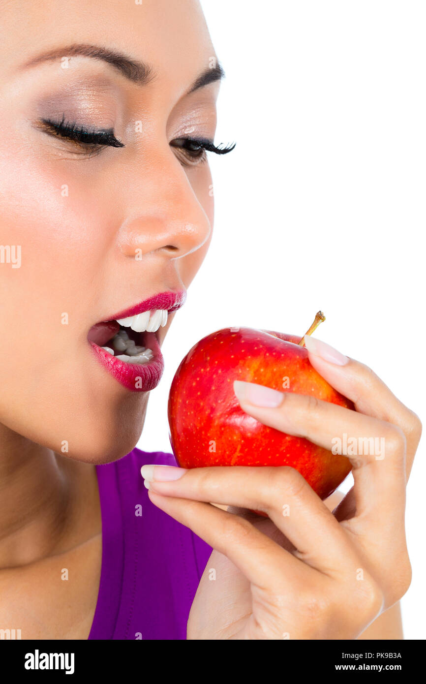 Woman eating apple Stock Photo - Alamy