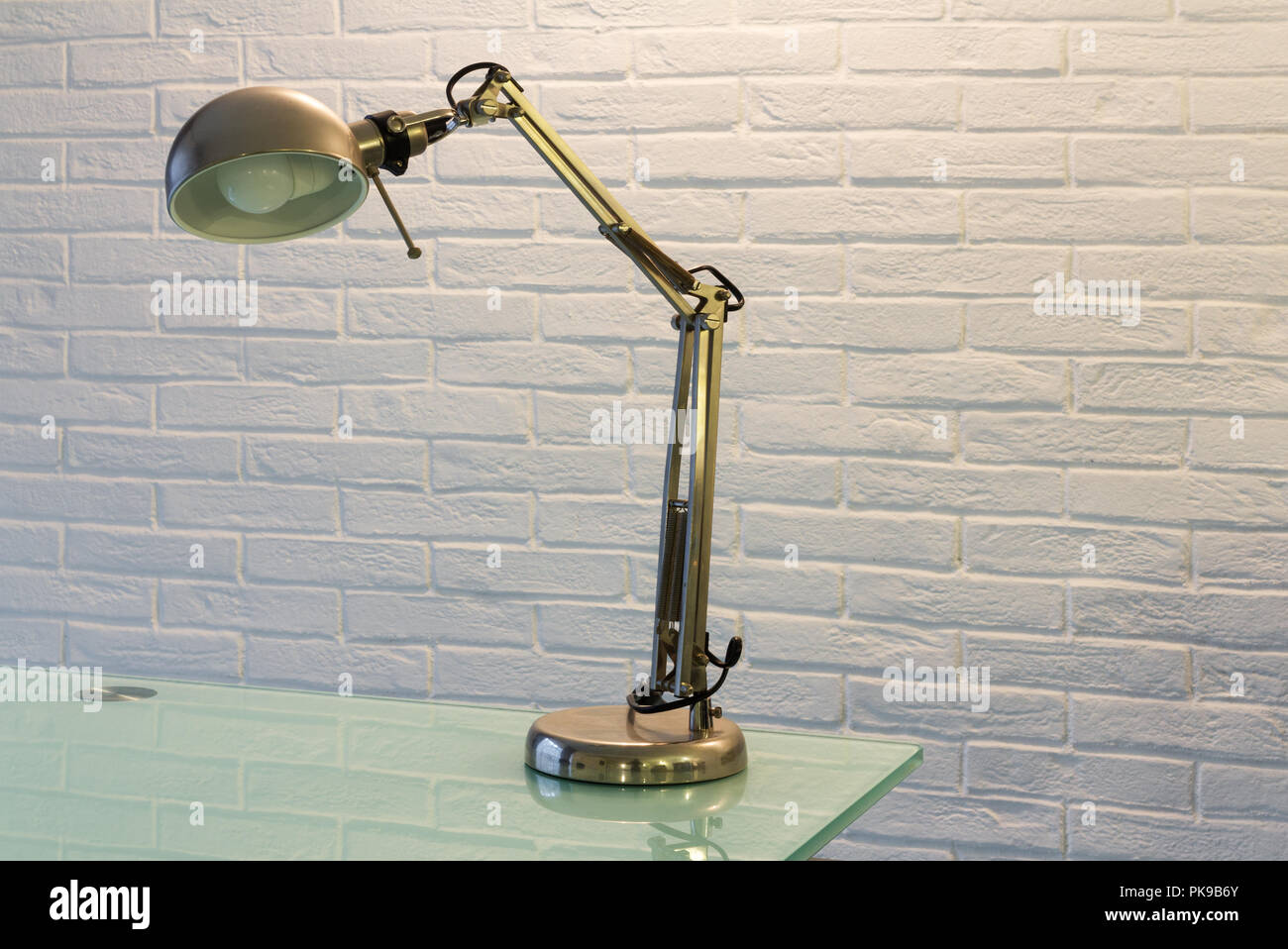 Interior, desk lamp in metal Stock Photo - Alamy
