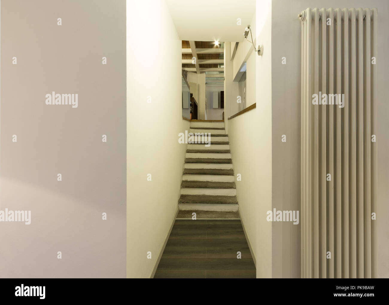 Architecture, wide loft. passage with staircase Stock Photo - Alamy