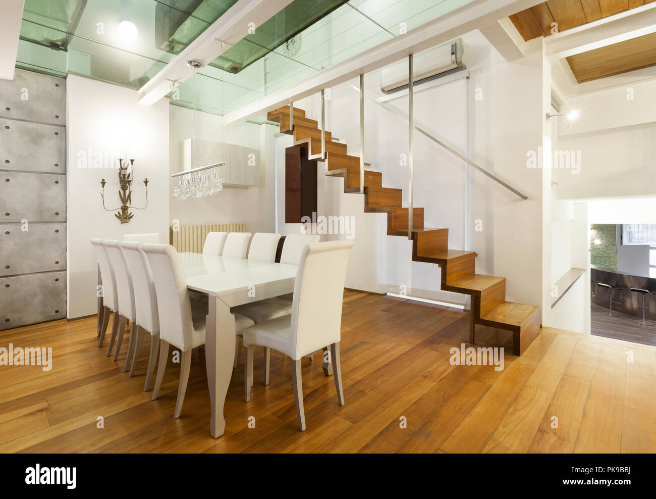 Architecture, wide loft with modern furniture, dining room Stock Photo ...