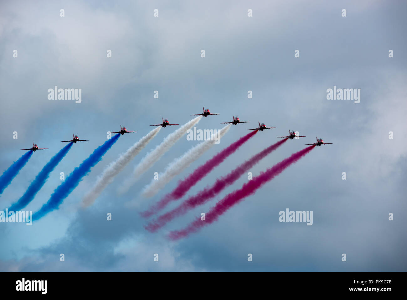 All nine Red Arrows Hawk jets with full smoke trails line up for their ...