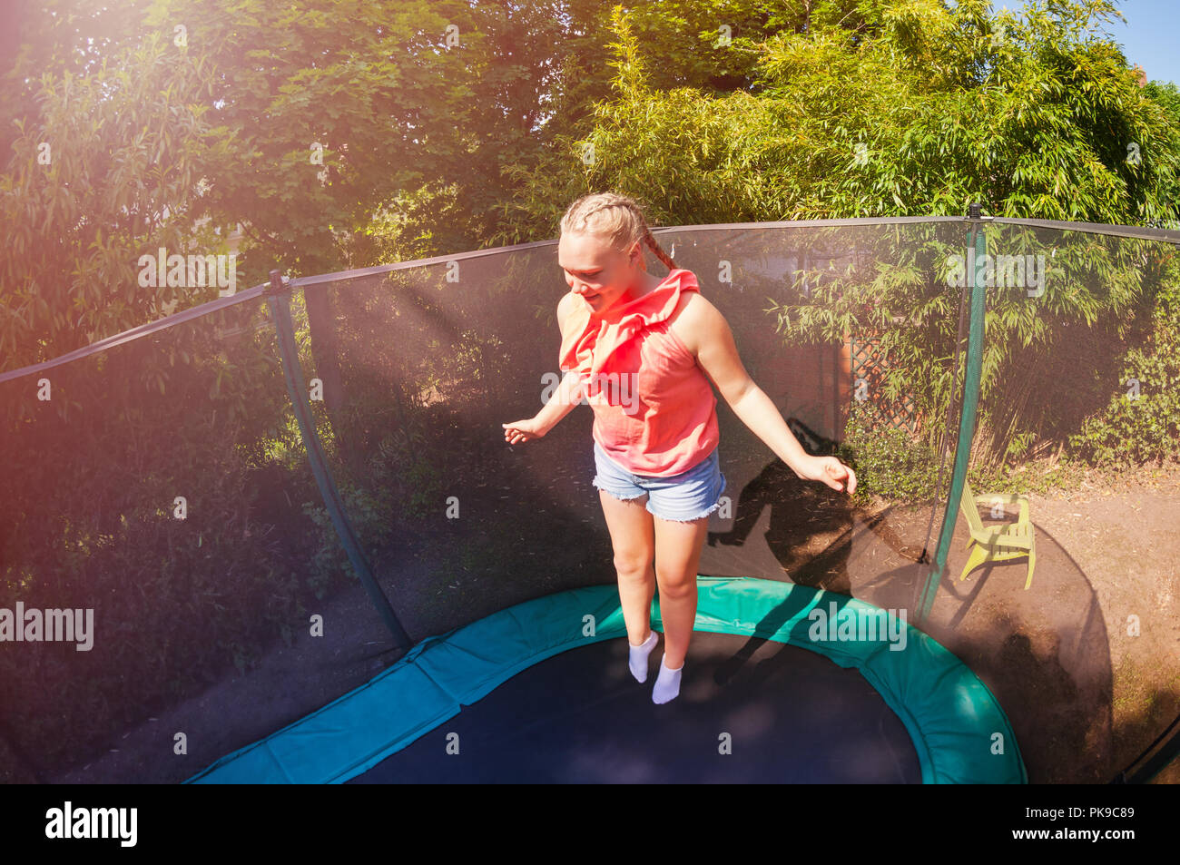 Kids jumping up and down hi-res stock photography and images - Alamy