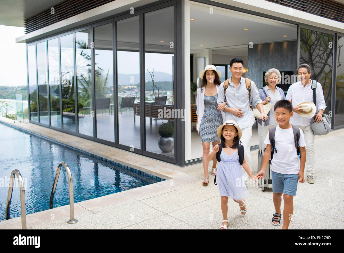 Happy family on vacation Stock Photo - Alamy