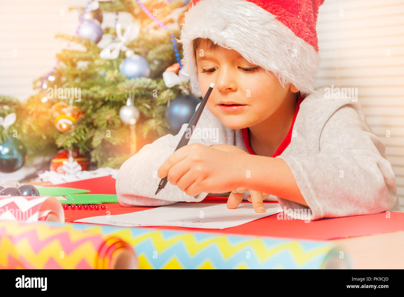 Boy writing letter hi-res stock photography and images - Alamy