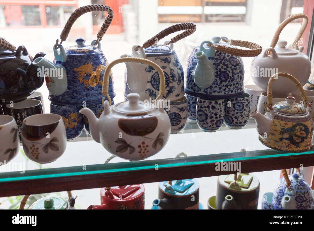 Teapots in the shop window. Beijing, China Stock Photo - Alamy