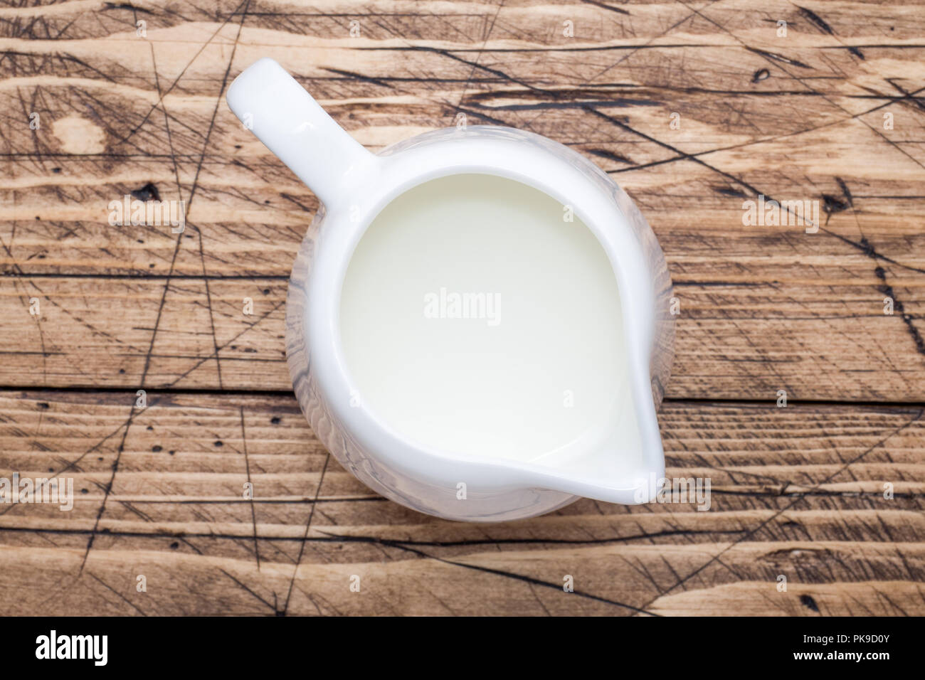 Fresh milk in the milk jug close-up Stock Photo - Alamy