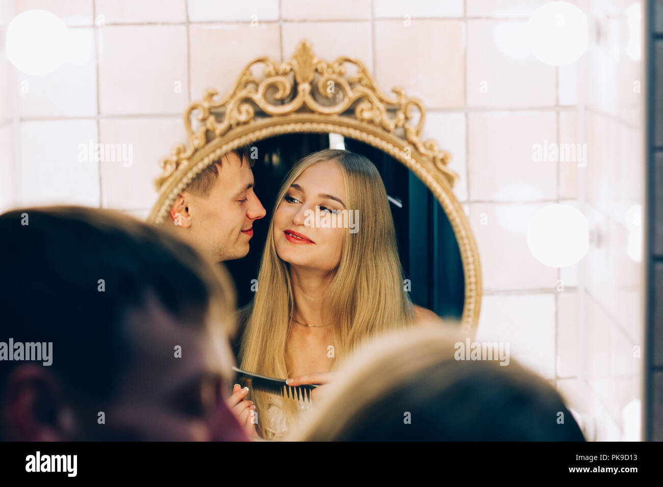 Couple hugging in bathroom hi-res stock photography and images - Alamy