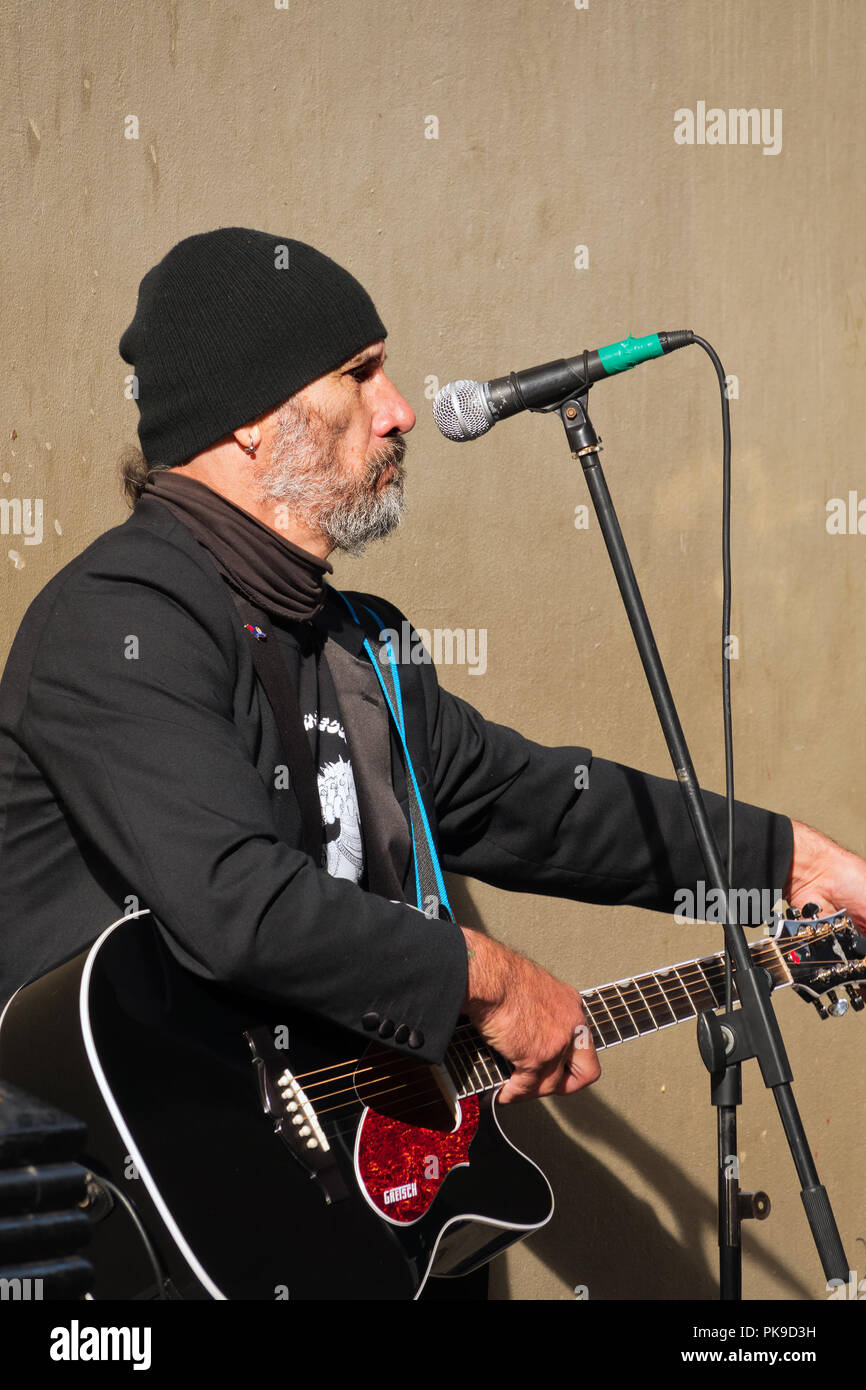 Busker street musician singer guitar player hi-res stock photography ...