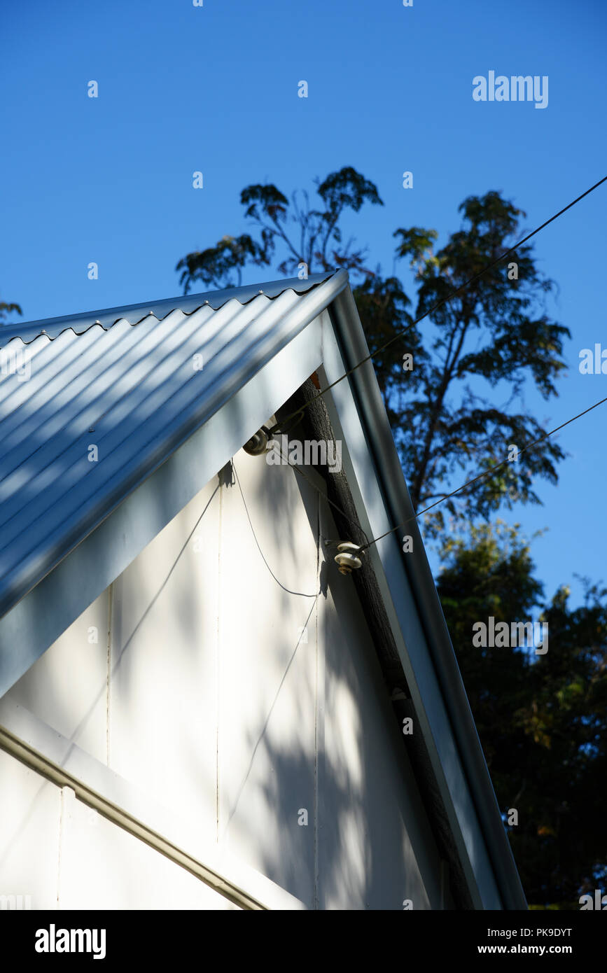 electricity power supply cables arriving at a small country house in ...