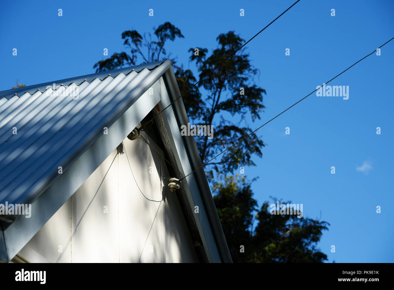 electricity power supply cables arriving at a small country house in ...