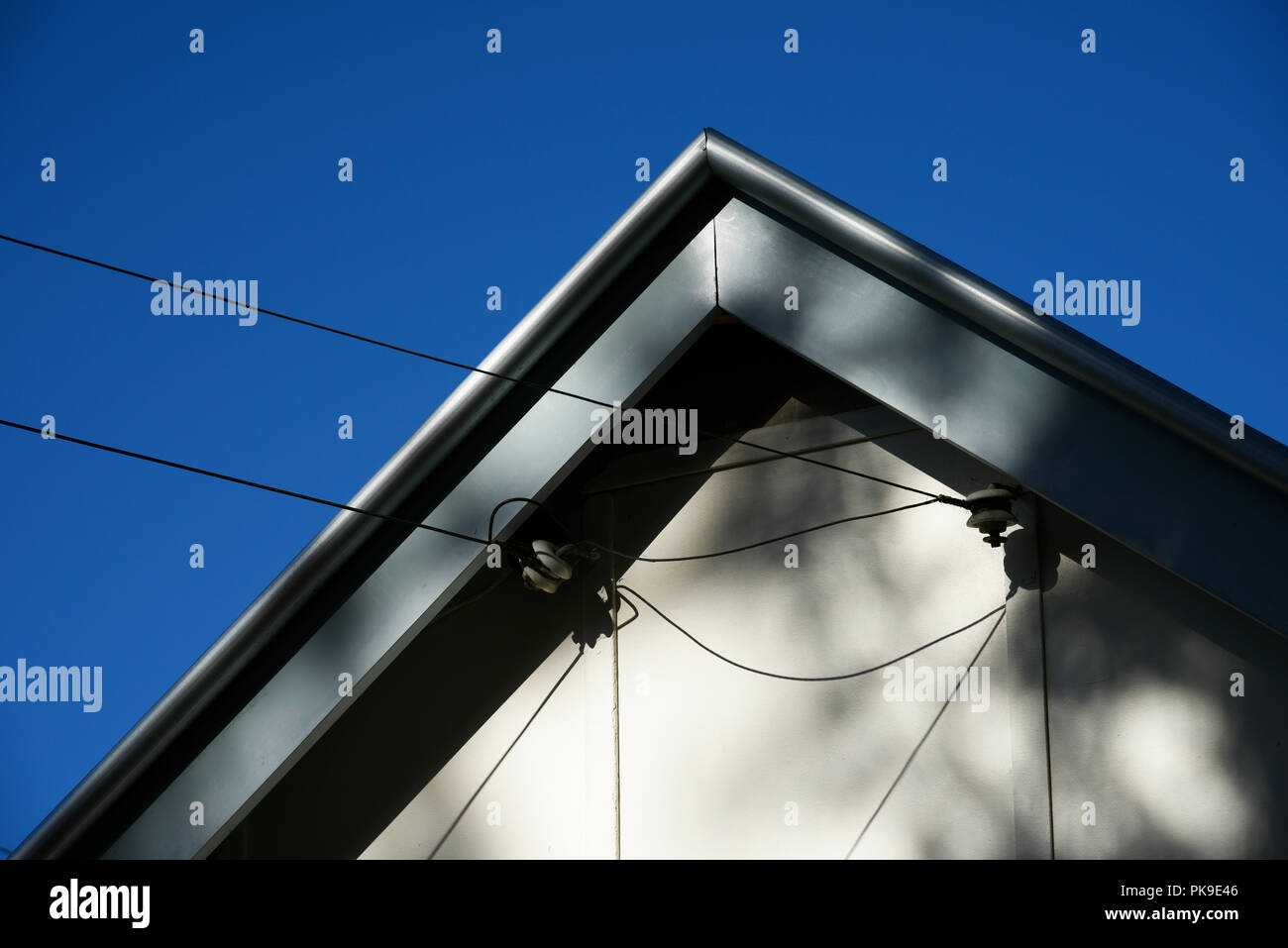 electricity power supply cables arriving at a small country house in ...